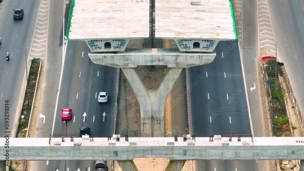 Elevated road construction site, rectangular structure supported by ...