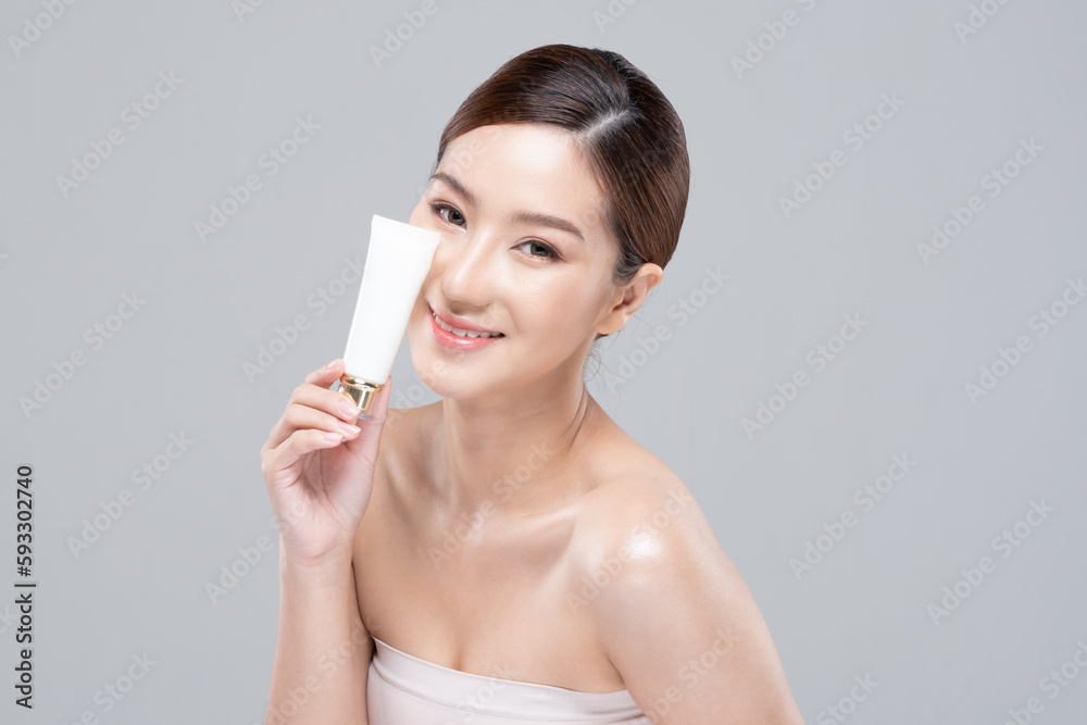 Beautiful Young Asian Woman Holding luxury white clean tube smile feeling so happy and cheerful ...