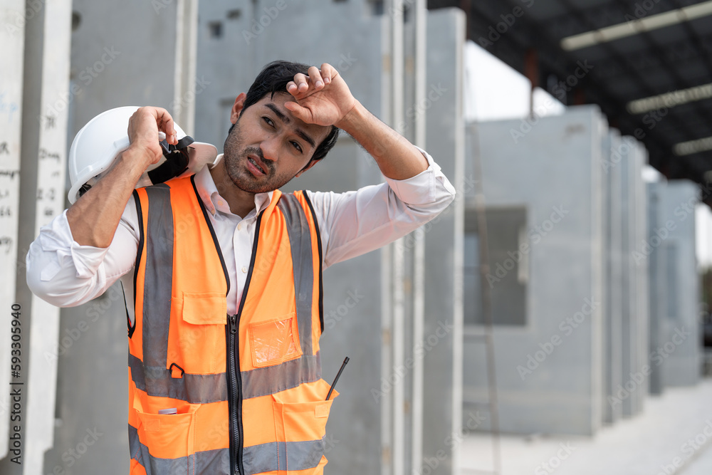 Asian man civil engineer feel tired from working outdoor at factory or ...