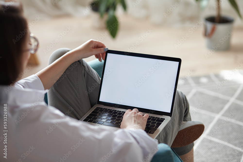 Poster Mockup white screen laptop woman using computer sitting on ...