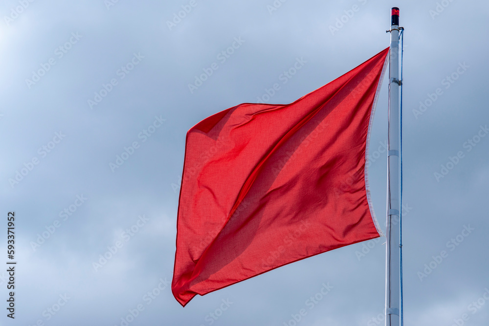 A red flag flying on a military shooting range, Red for danger Stock ...