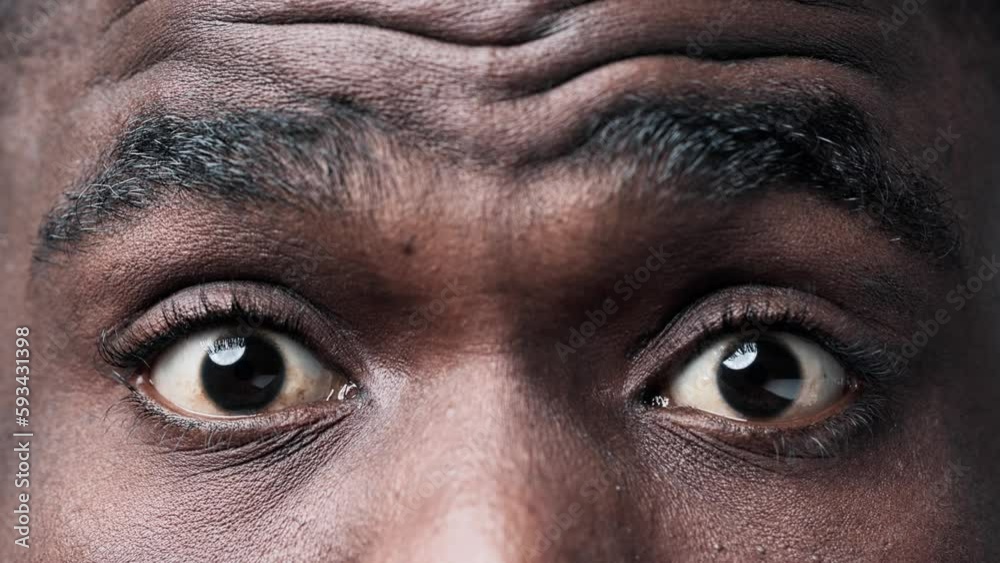 African American Man Looking at Camera with Staring Eyes in Close up ...