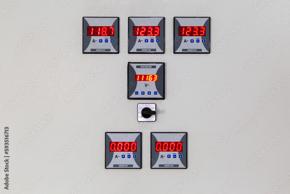 Digital voltmeter, amp meter and signal lamp on control panel of power ...