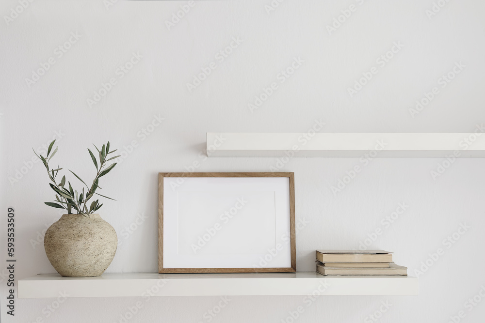 Elegant interior still life. Two floating shelves. Blank wooden picture ...
