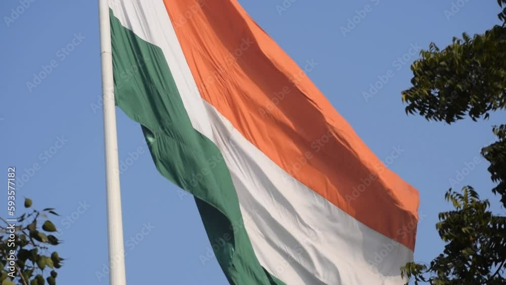 India flag flying high at Connaught Place with pride in blue sky, India ...