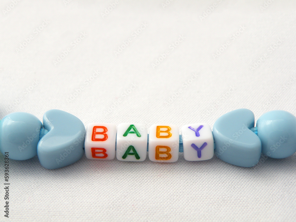 Baby word formed with cubes that are part of a pacifier clip Stock ...