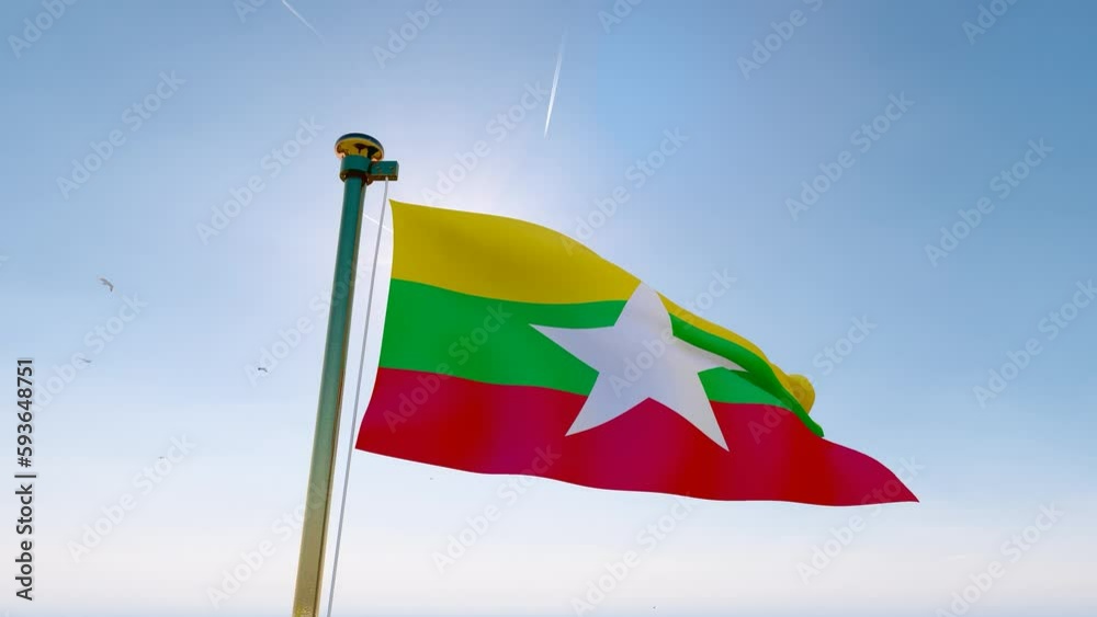 Burma national flag waving in beautiful blue sky. Flag of Burma waving ...