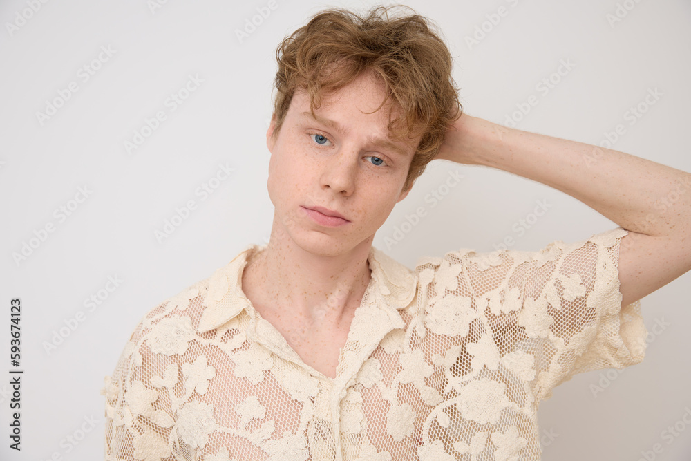 Fashion portrait of a handsome red head man with a perfect skin and ...