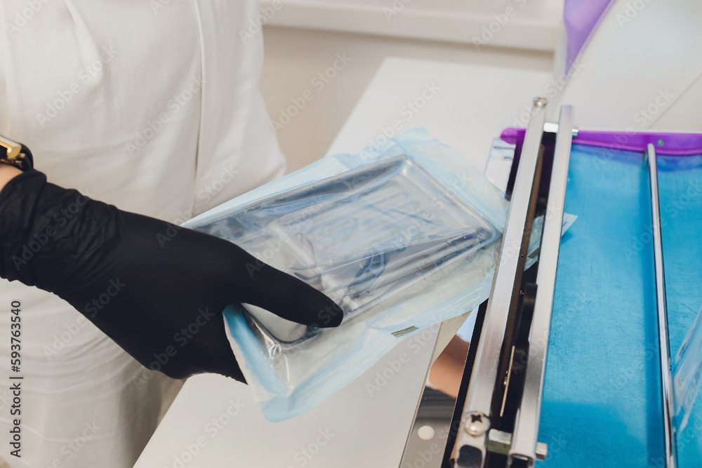 Disinfection of a dental instrument. Ultrasound sterilization of a ...