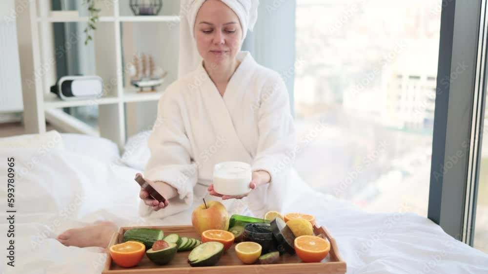 Attractive healthy female after bath feeling fresh aroma of light ...