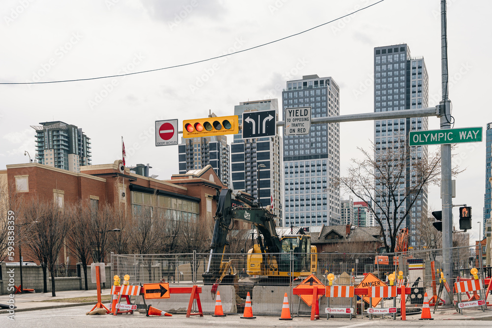blocked road with road signs in downtown calgary, canada - may 2022 ...