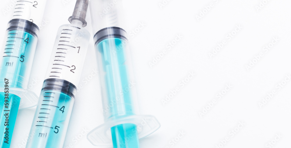 Disposable plastic syringe prepared for injection and vaccination in ...