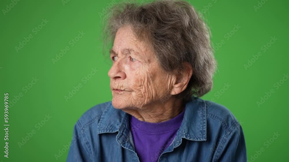 Slow motion closeup portrait of angry upset frustrated angry elderly ...