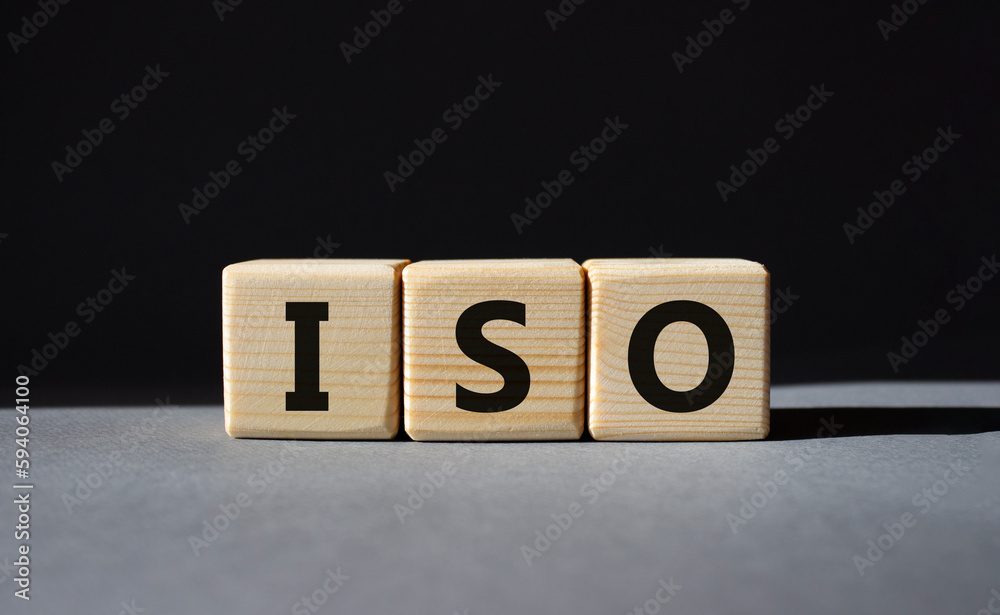 ISO standards quality control symbol. Concept word ISO on wooden cubes ...