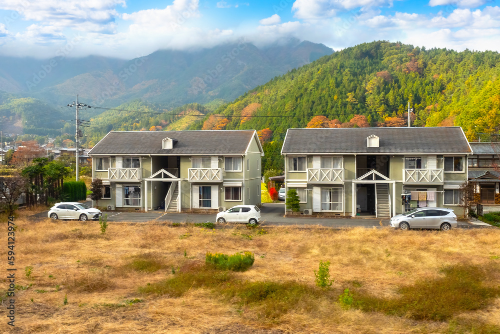 Regions of Japan. City in asia. Two-story residential buildings. Houses ...