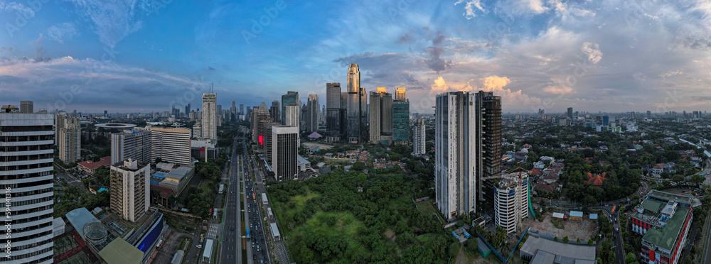 aerial shoot of Jakarta skyline during the golden hour. Jakarta is the ...