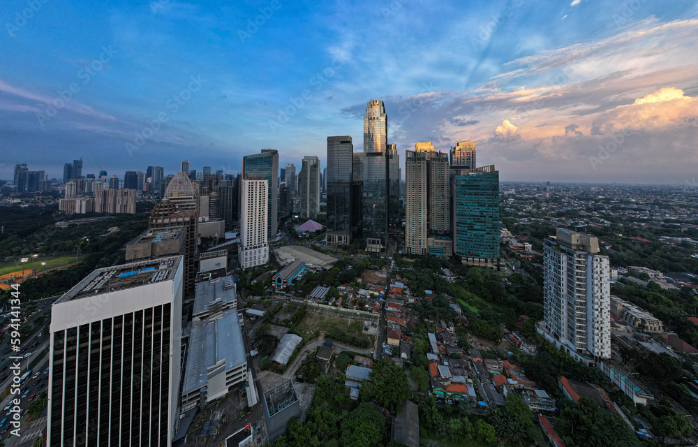 aerial shoot of Jakarta skyline during the golden hour. Jakarta is the ...