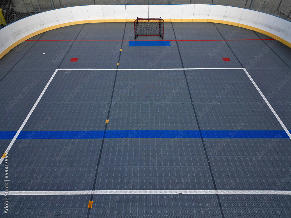 field hockey or ice hockey field. plastic grids of the dportovist ...