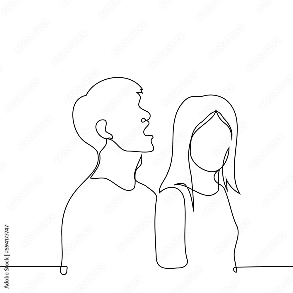 tall man stands behind close to a woman and either shouts into her ear ...
