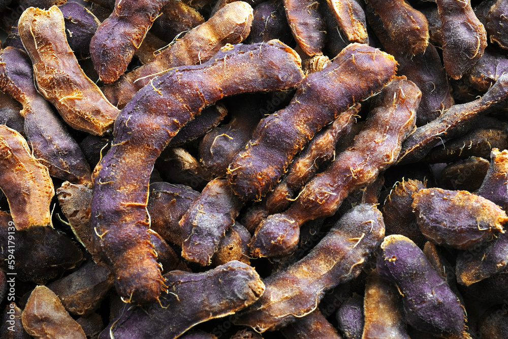 Organic tamarind peel, tamarind background, It is brown in color and ...