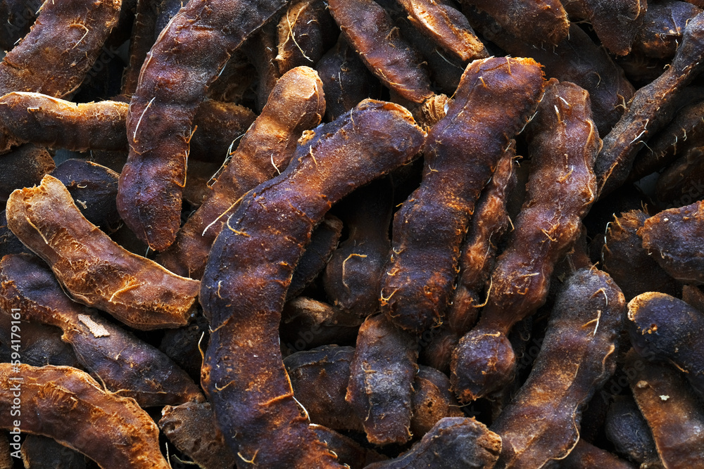 Organic tamarind peel, tamarind background, It is brown in color and ...