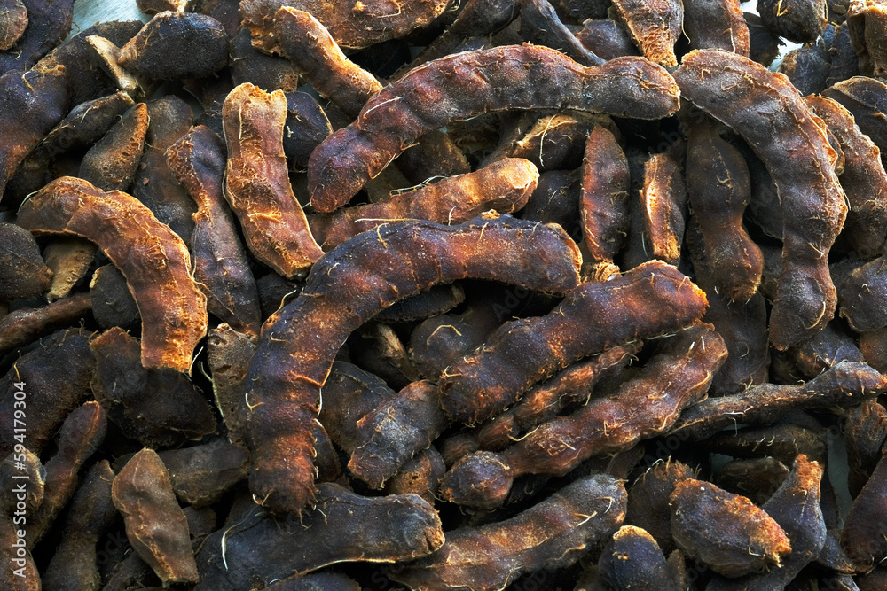 Organic tamarind peel, tamarind background, It is brown in color and ...