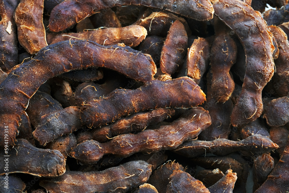 Organic tamarind peel, tamarind background, It is brown in color and ...