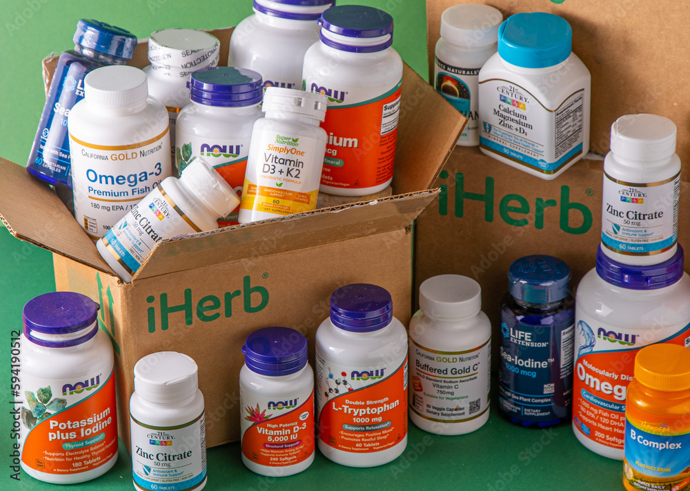 Vitamins, minerals and micronutrients from iHerb box. Lots of different ...