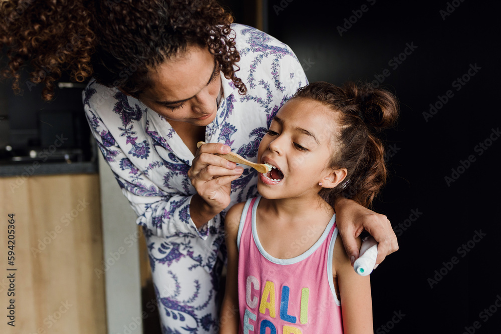 Hispanic Boy Brushing Teeth