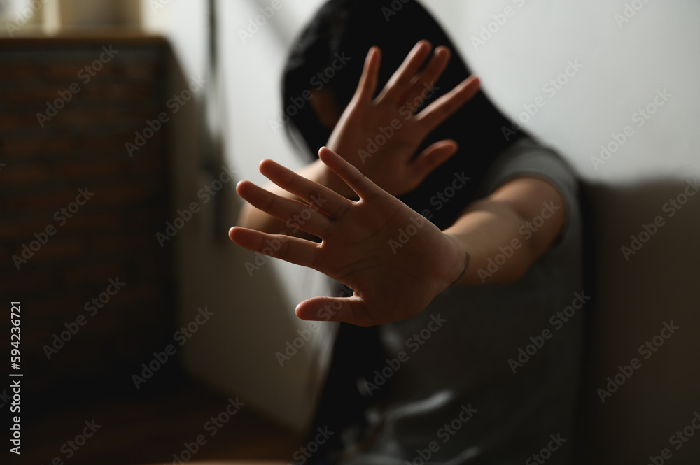 Foto de Silhouette low key dark shadow of young woman feeling sad upset ...