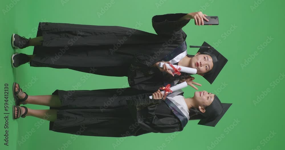 Full Body Of Asian Woman Students Graduate In Caps And Gowns With ...