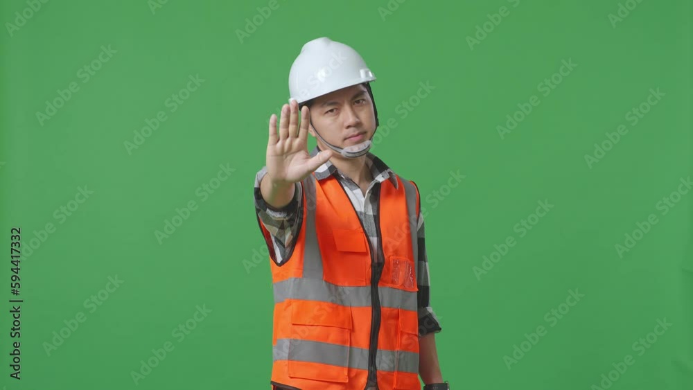 Asian Male Engineer With Safety Helmet Disapproving With No Hand Sign ...