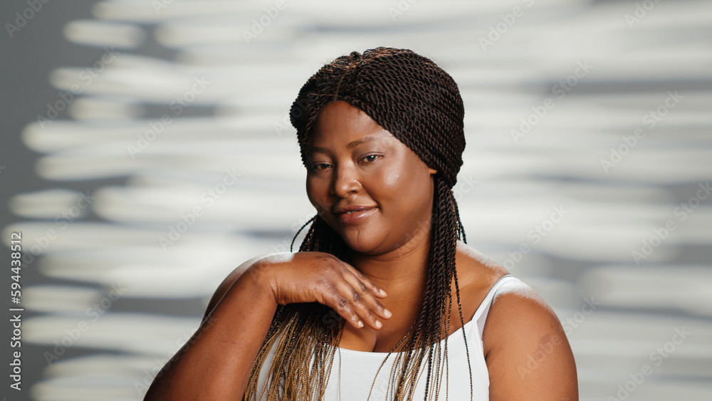 Young flawless model making elegant gestures on camera, advertising ...