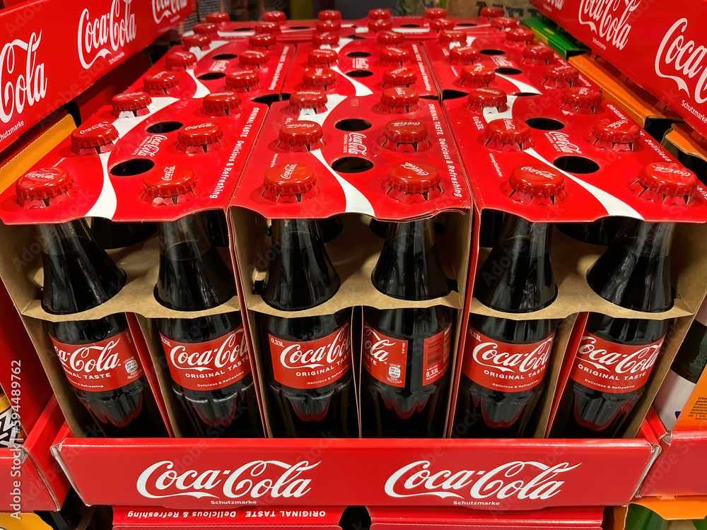 GERMANY - APR 19, 2023: Multiple bottles of Coca-Cola displayed in a ...