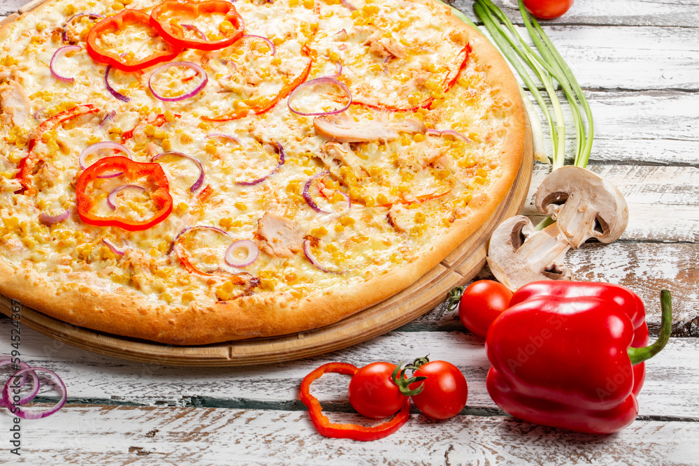 Pizza with chicken, paprika and corn. Italian kitchen and cooking ...