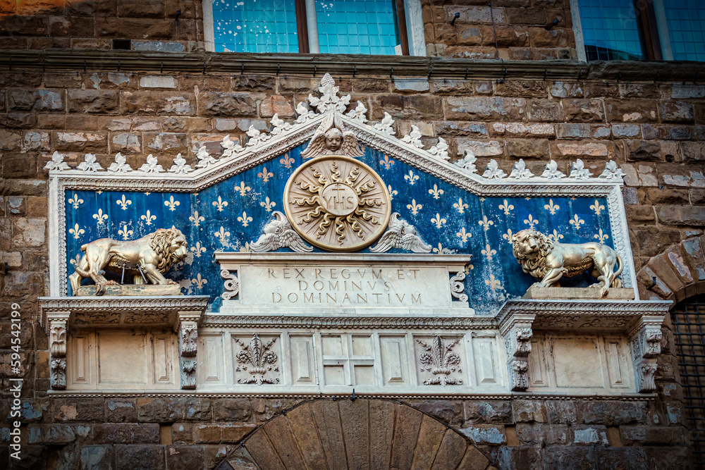 The ornate marble plaque adorning the Palazzo Vecchio door with two ...