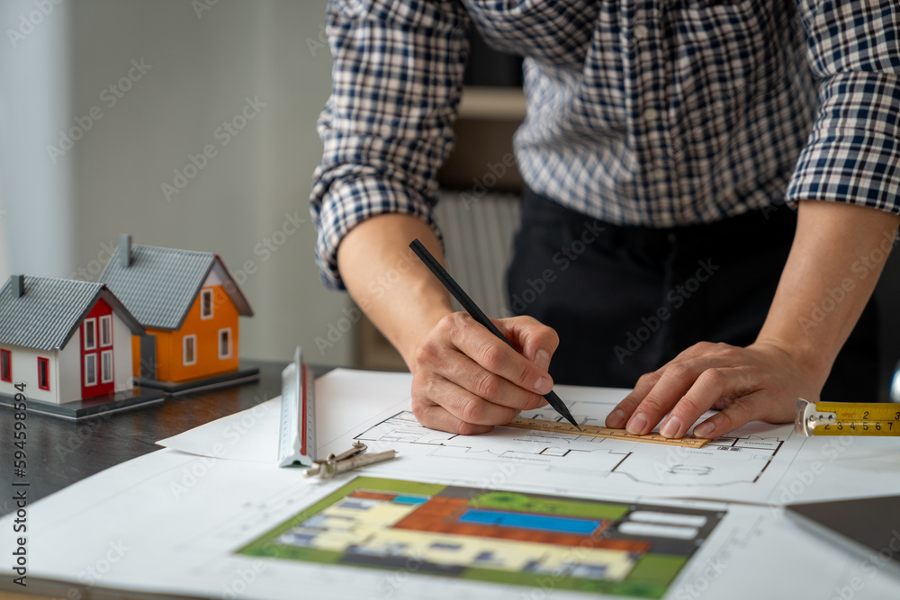 Engineer, architect, contractor starting to draw house plan structural ...