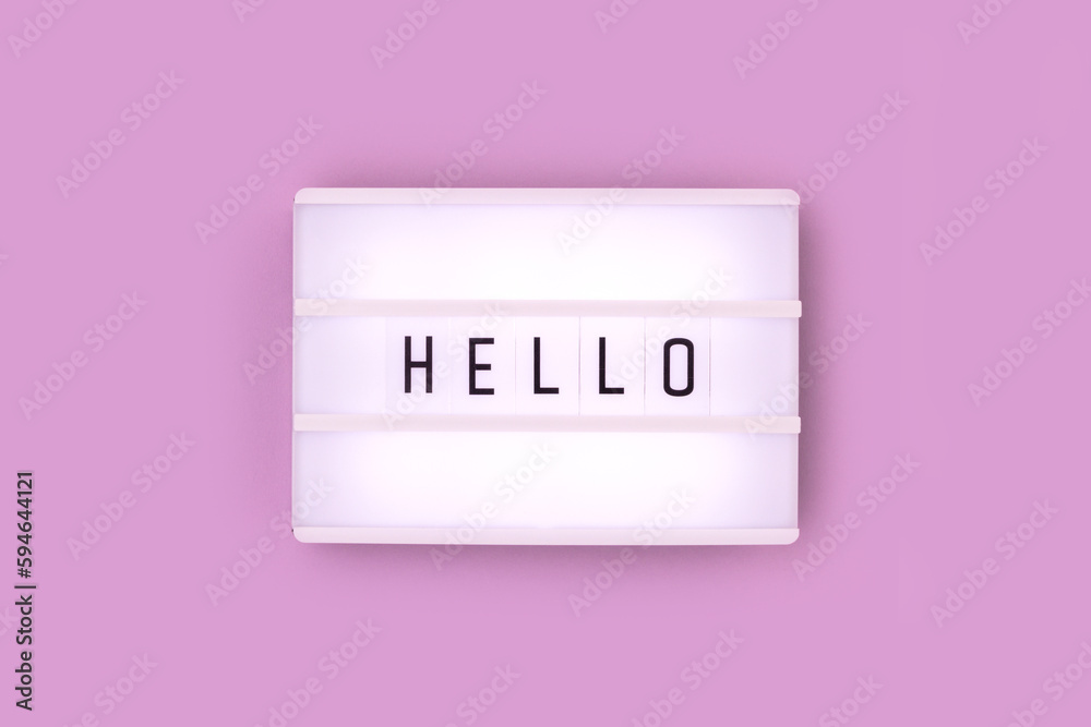 Word Hello. White lightbox with letters on a purple background. Stock ...
