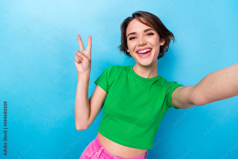 Photo Of Sweet Shiny Woman Wear Green T Shirt Tacking Selfie Showing V