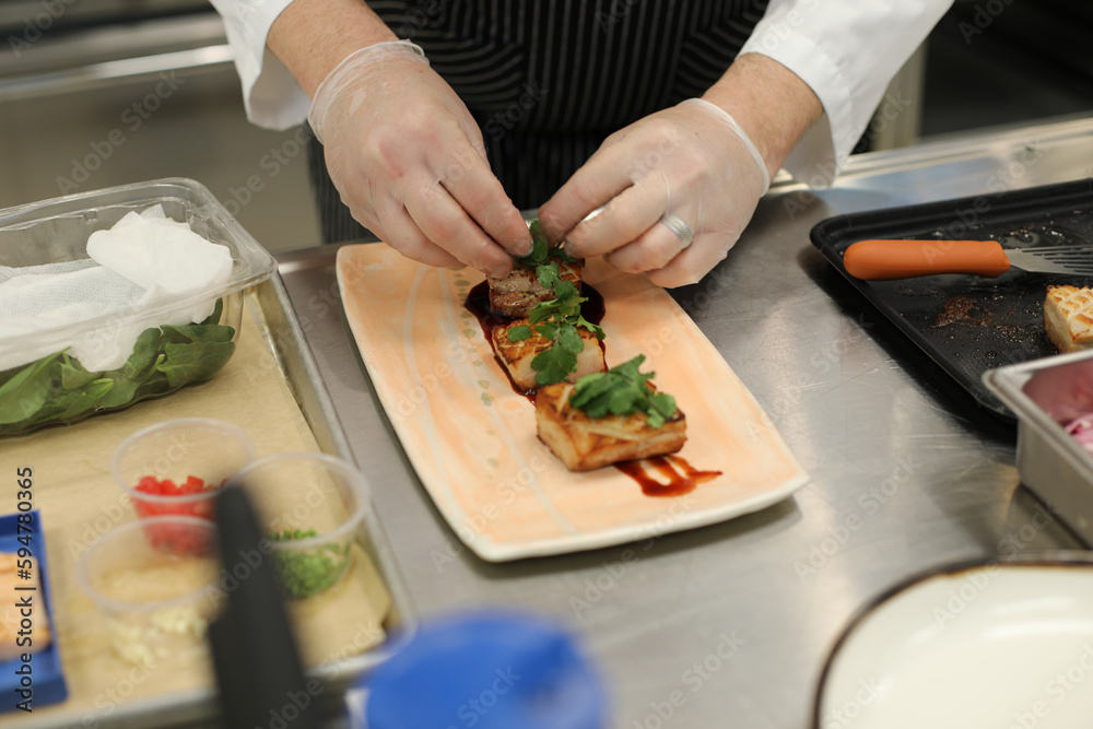 Chef Plating Sous Vide Red Wine Braised Pork Shoulder in Commercial ...