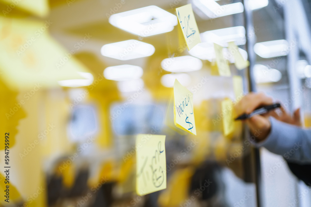 Modern group of people sharing ideas concept with paper note writing ...