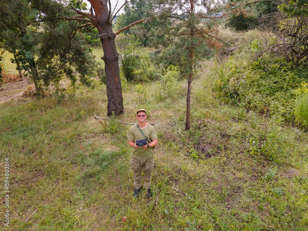 UAV operator. Ukrainian scout with drone equipment. Armyman. War. Stock ...