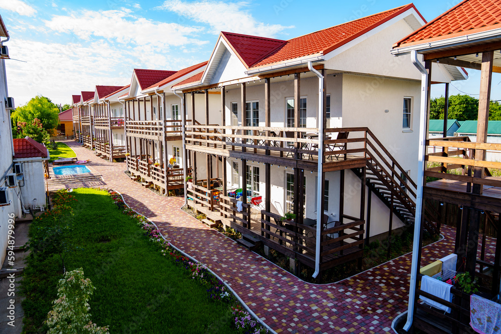Typical two-storey buildings for a hotel or guest house for a family ...