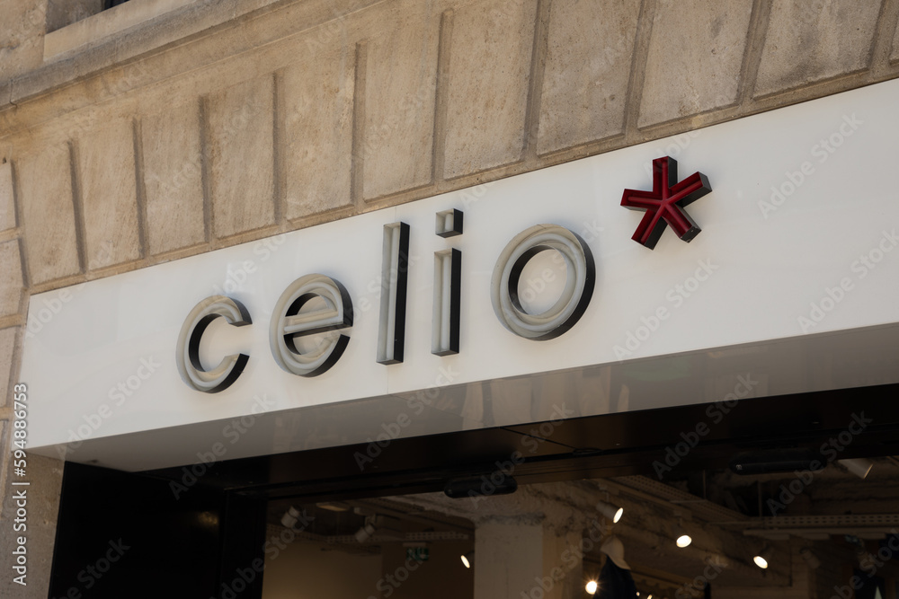 celio asterisk red cross sign brand and text logo facade men clothing ...