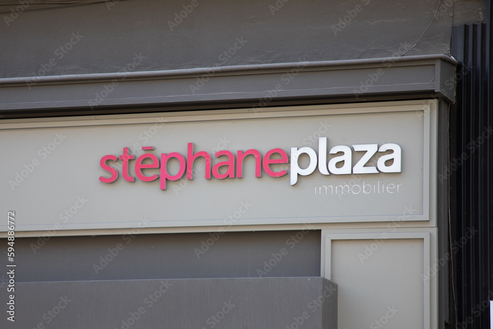 stephane Plaza logo text and brand sign office facade of real estate ...