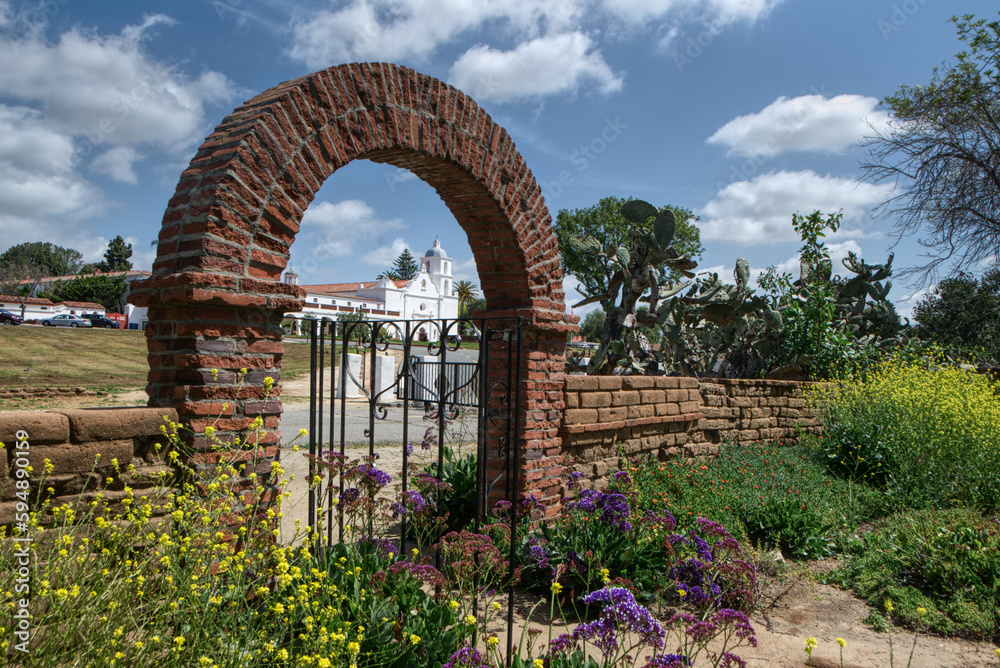 brick arch gate at historic California mission San Luis Rey in ...