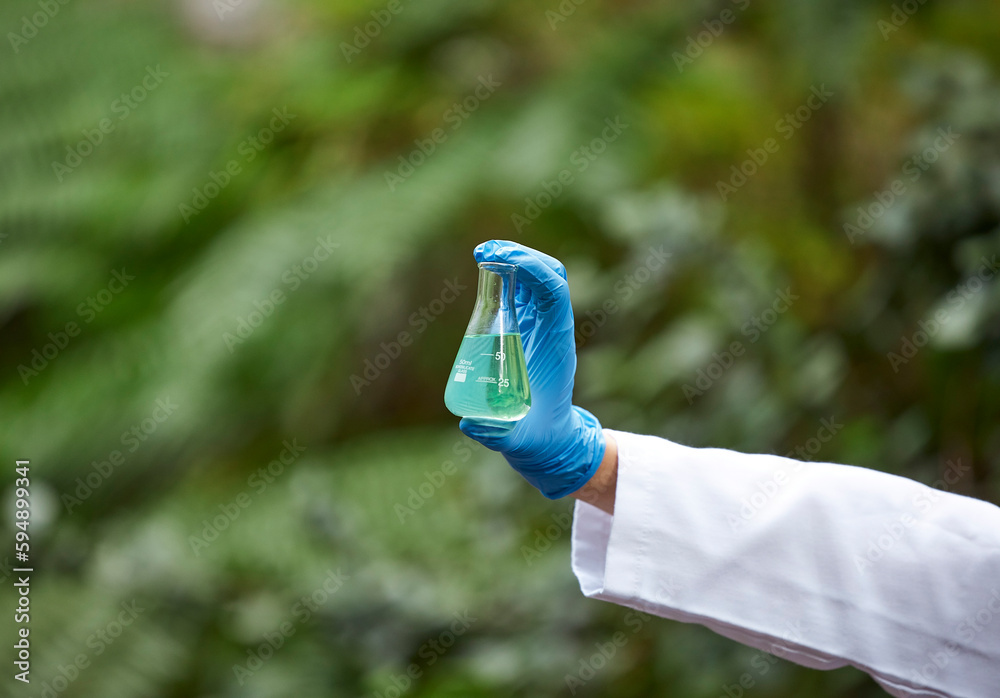 Science, nature and scientist hand with beaker for liquid sample ...