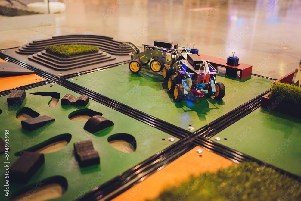 Homemade robot on wheels with eyes. Hobby robotics. Stock Photo | Adobe ...