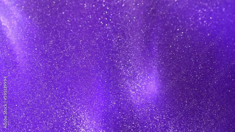 Purple Stardust Dreams. A Hypnotic View of White Dust Particles in ...