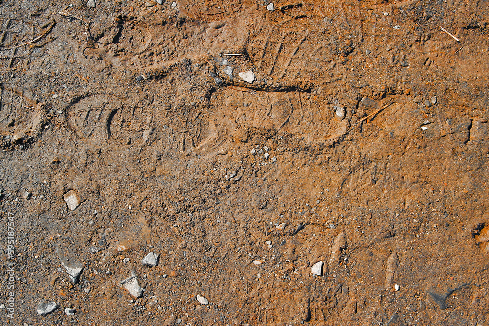 Wet ground with footprints. Mud ground with human footprints. Soil ...